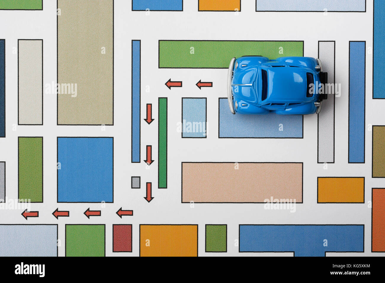 Model of car on road map - closeup Stock Photo - Alamy