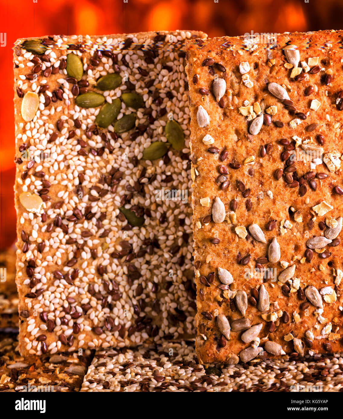 Two crisp bread slices, red background Stock Photo - Alamy