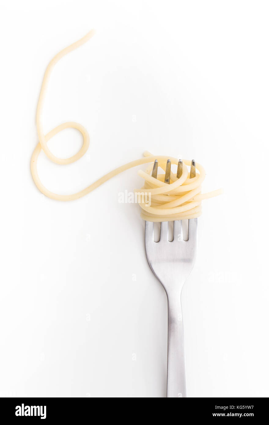 Plain cooked spaghetti pasta on fork, on white background Stock Photo ...