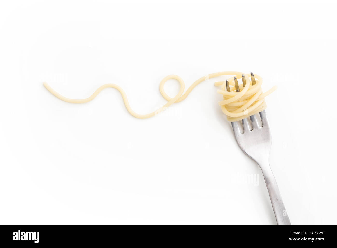Plain cooked spaghetti pasta on fork with swirl, on white background ...