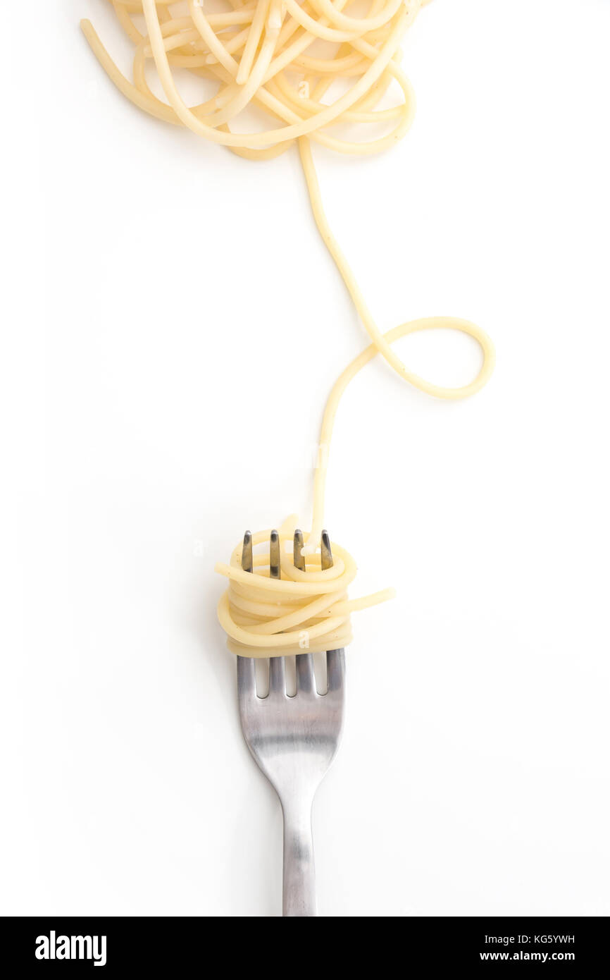Plain cooked spaghetti pasta on fork, on white background Stock Photo ...