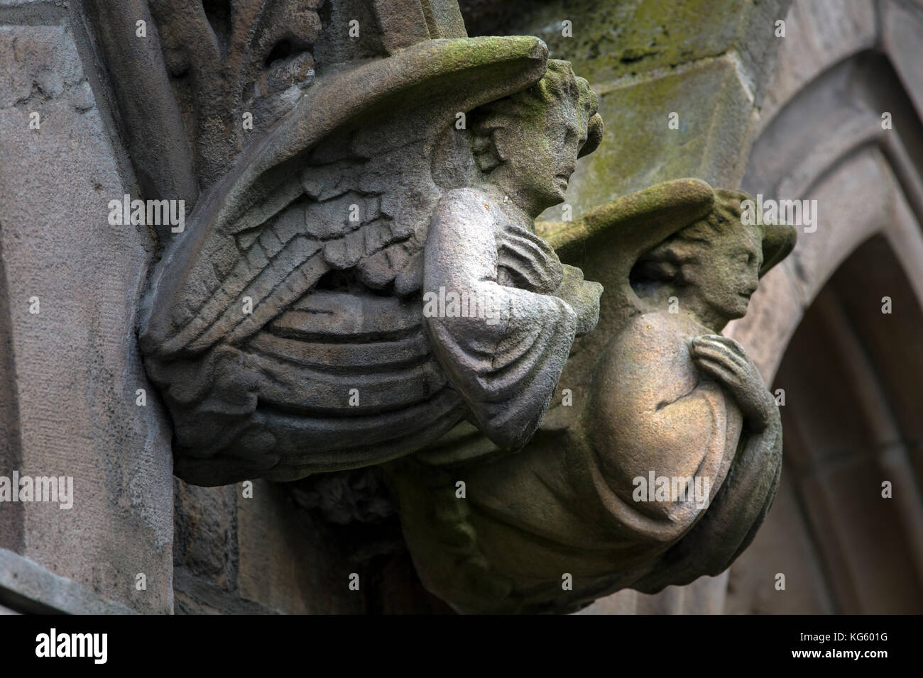 angels carved from stone on an old irish church Stock Photo - Alamy