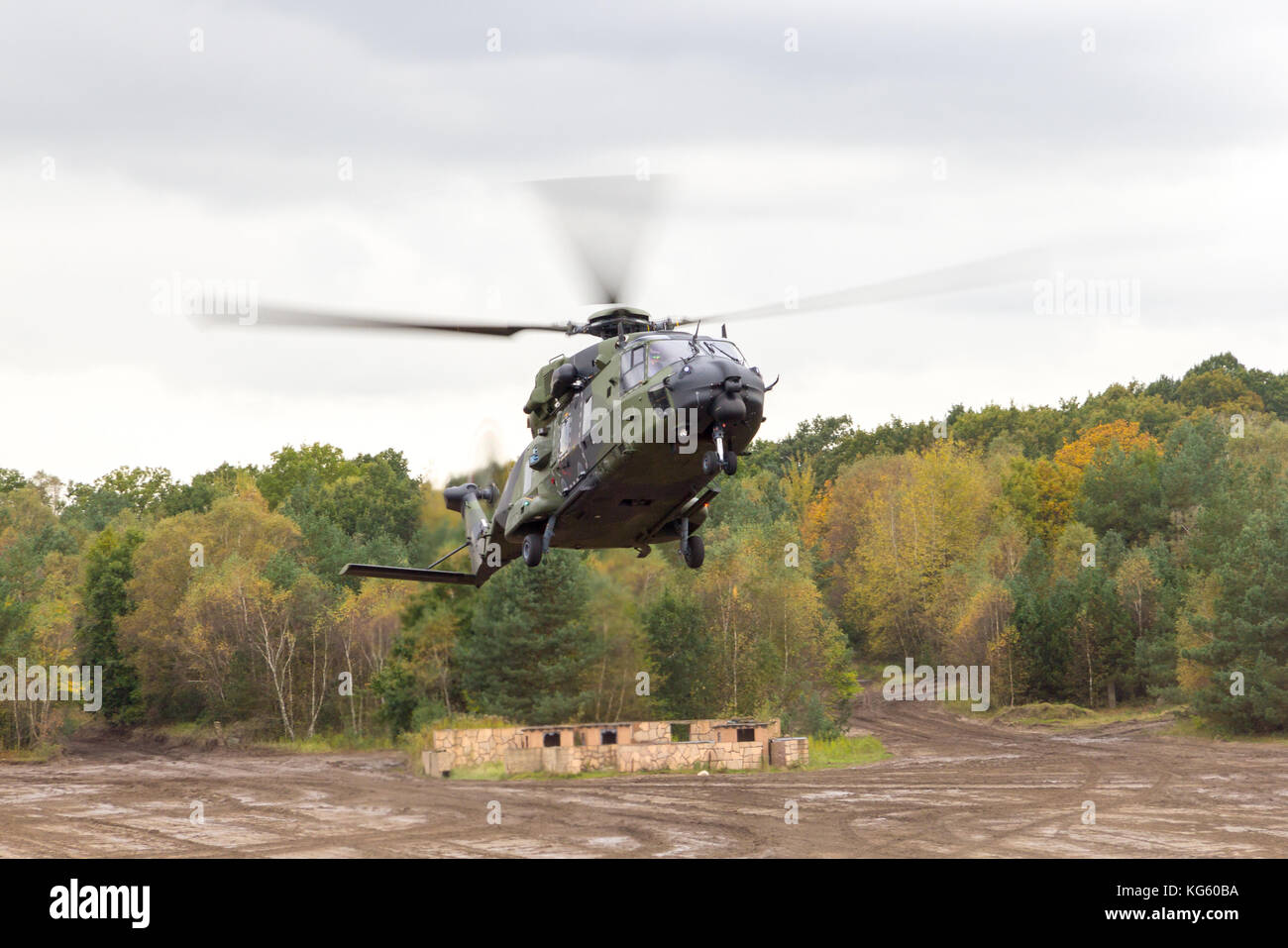 german military helicopter in flights over battlefield Stock Photo - Alamy