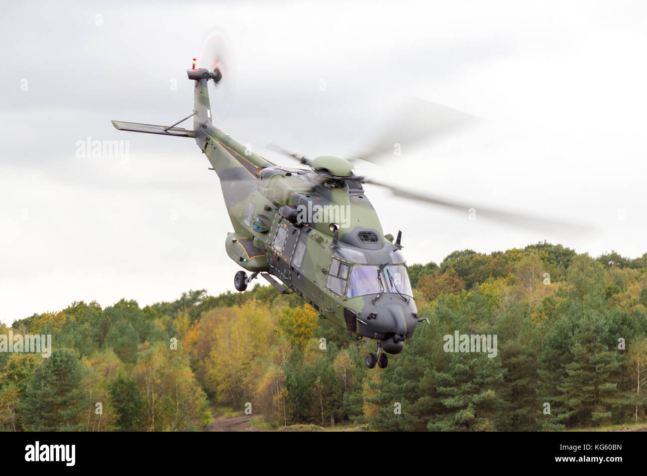 german military helicopter in flights over battlefield Stock Photo - Alamy