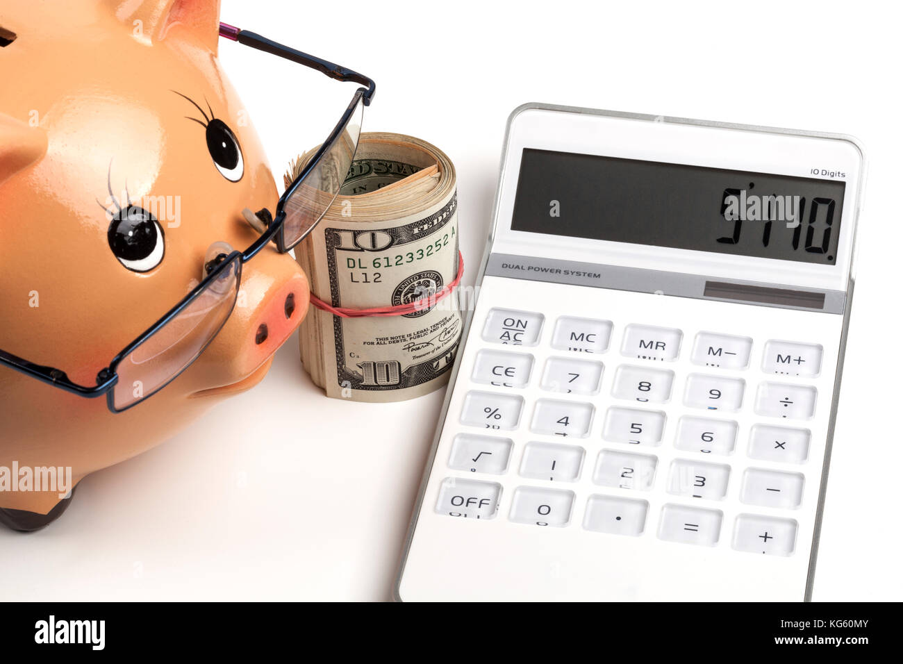 Piggy Bank With Dollars Roll and Calculator Isolated on White ...