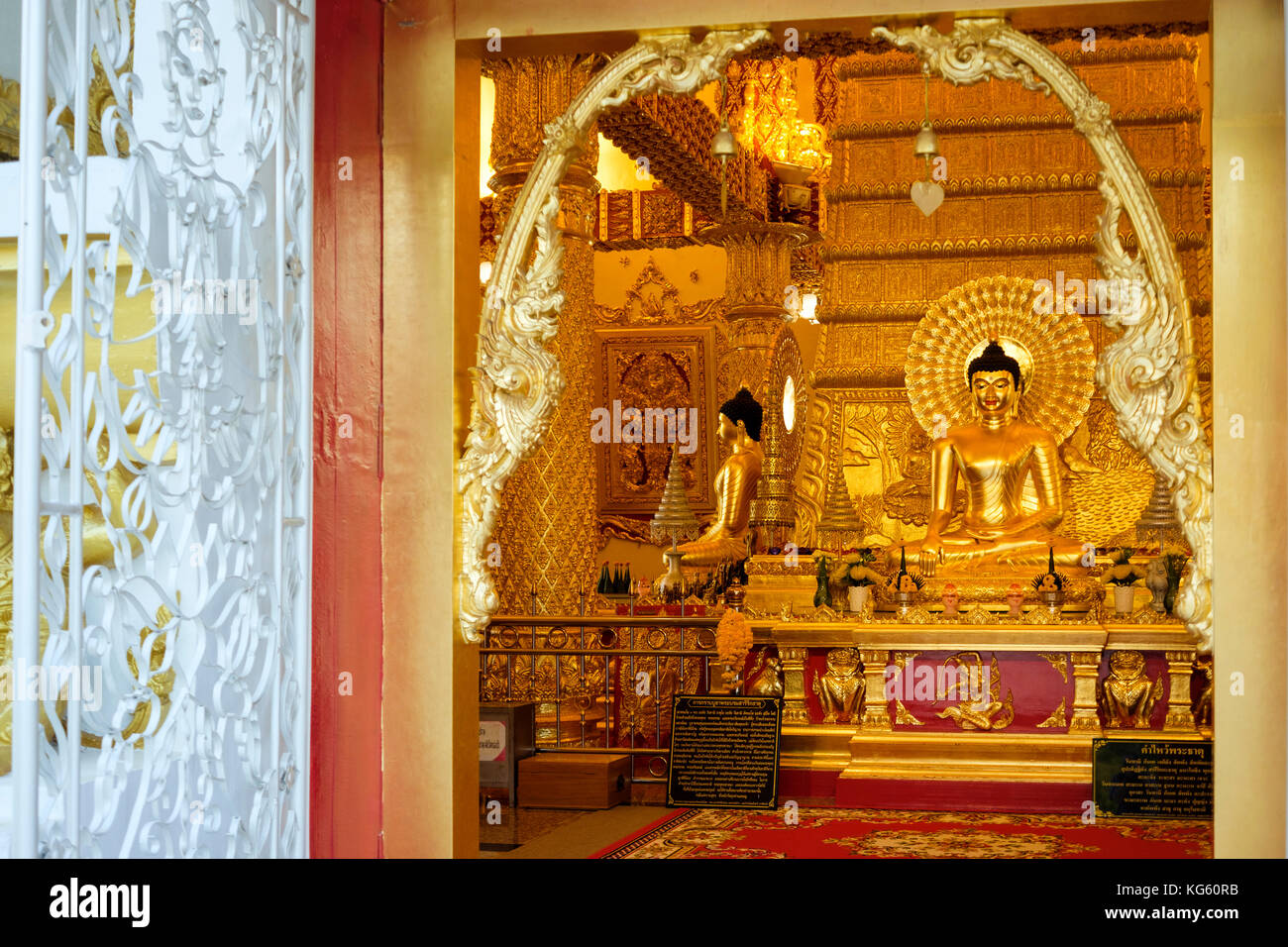 Golden interior and Buddha statues inside the chedi (stupa) at Wat Nong ...