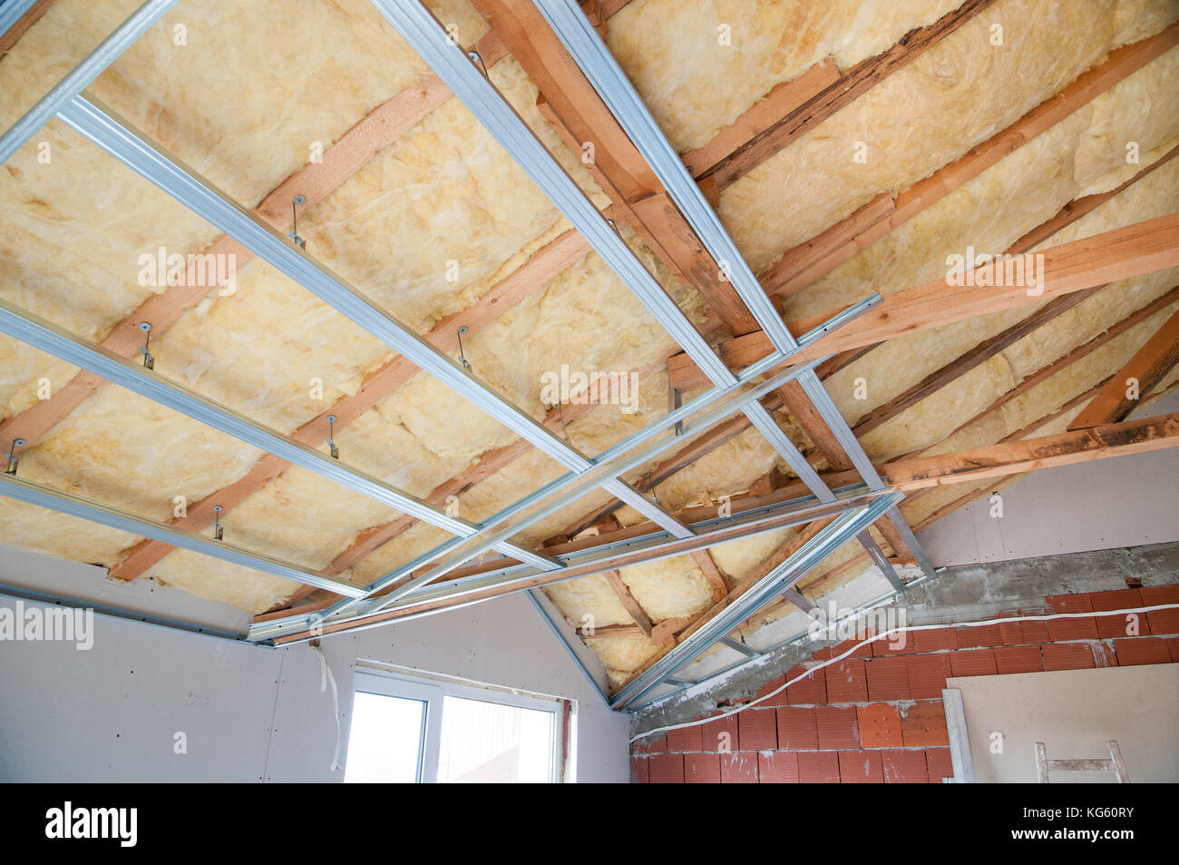 Part of Construction of ceiling insulation- wool and wood Stock Photo ...