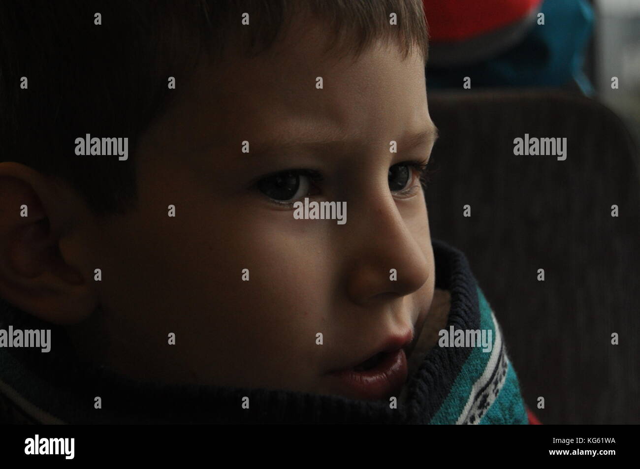 Boy watching the city through the window subway Stock Photo - Alamy
