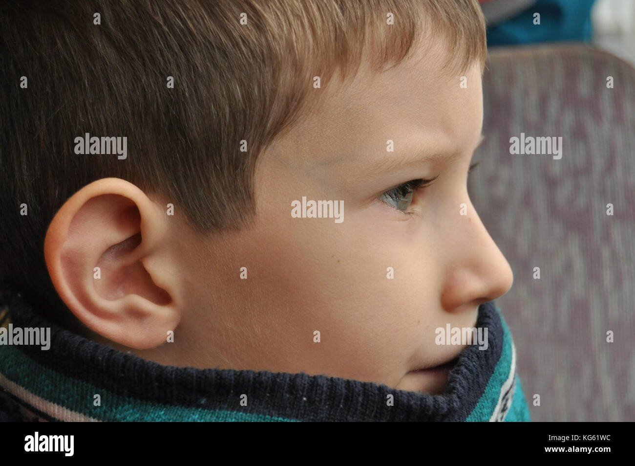 Boy watching the city through the window subway Stock Photo - Alamy