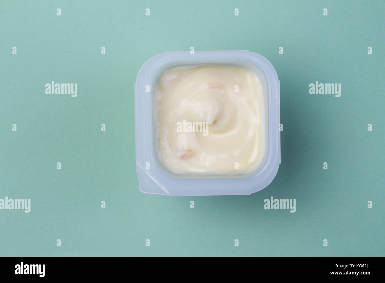 Healthy pale yellow fruit flavored yoghurt with natural coloring in ...