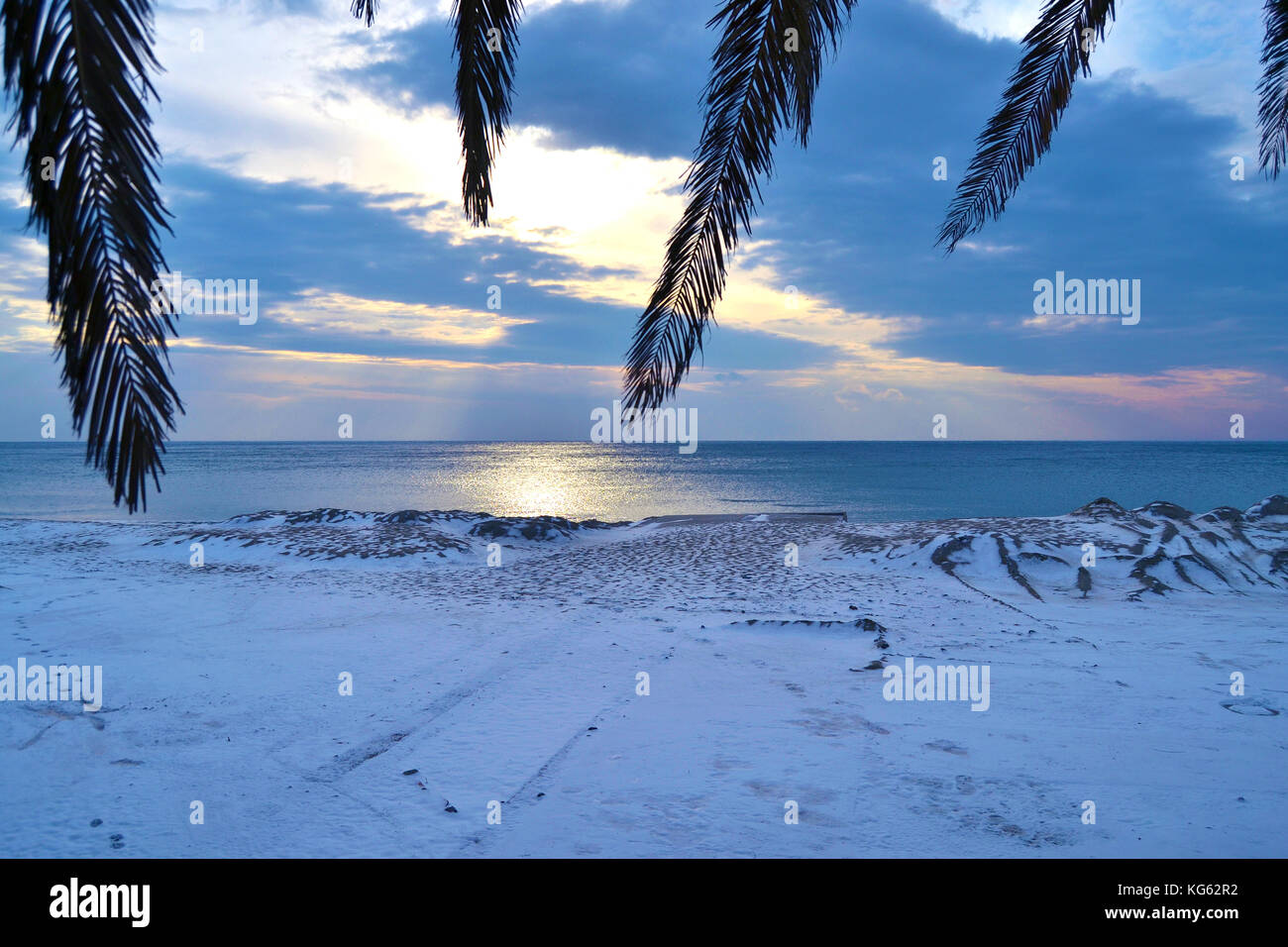 magical landscape of a snowy beach on the Mediterranean Sea, in italy ...