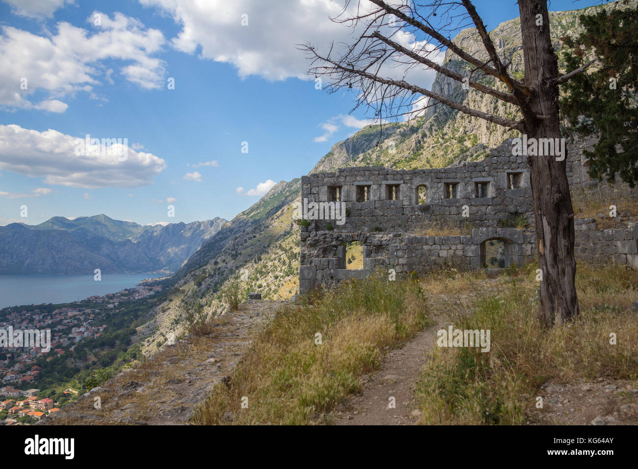 Fortress ruins along the steep climb on Kotor's Old City Walls with ...