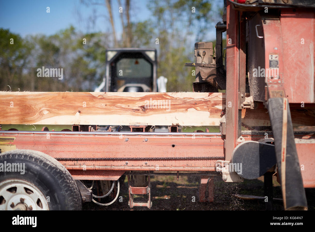 Portable wood milling machine on a truck or trailer with a plank of ...