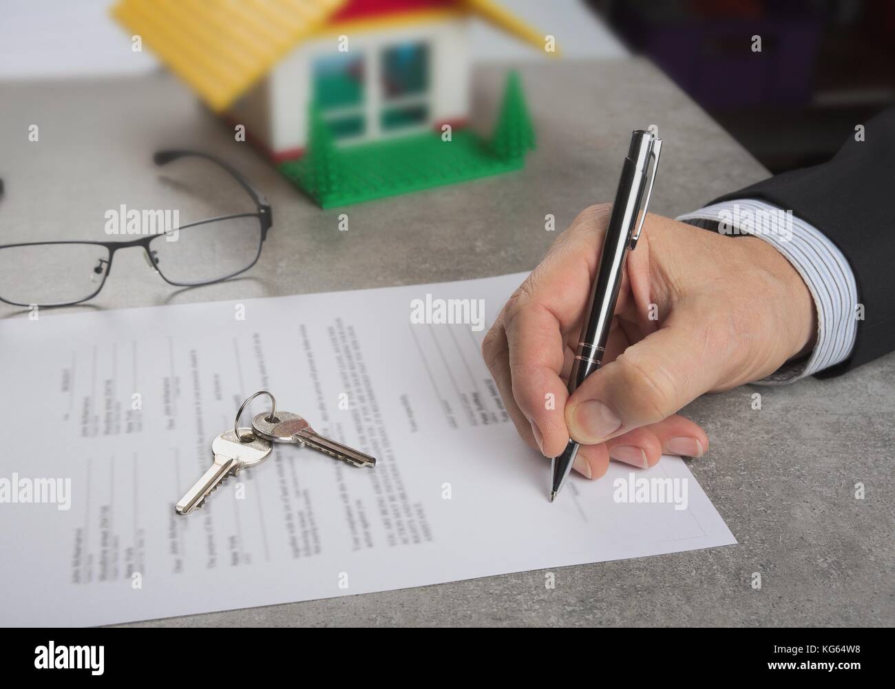 Signed house purchase agreement after the loan approval Stock Photo - Alamy
