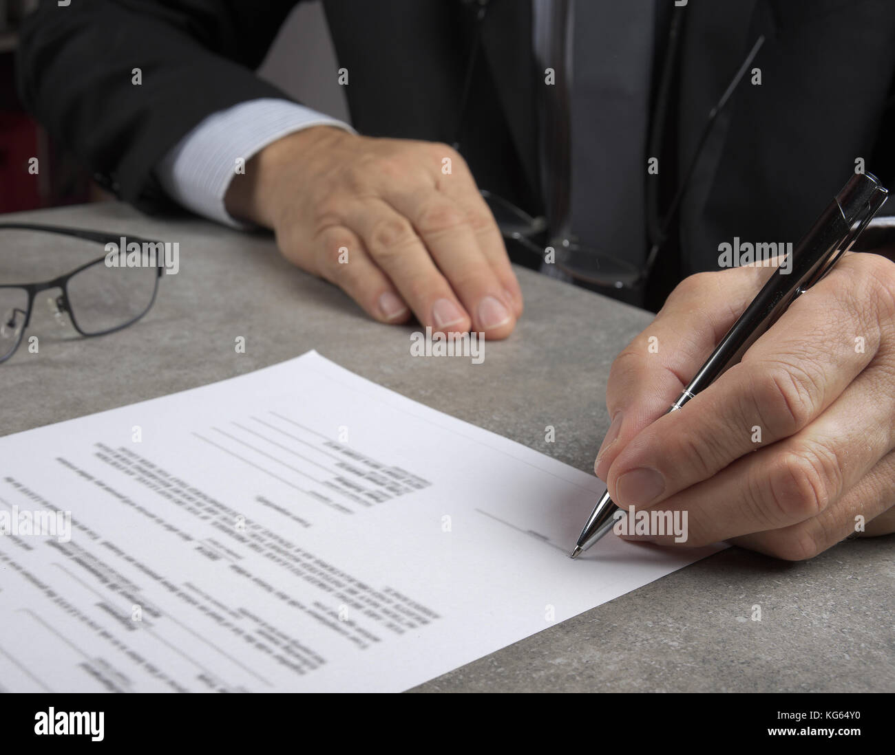 Business man signing a contract making a deal, classic business concept ...