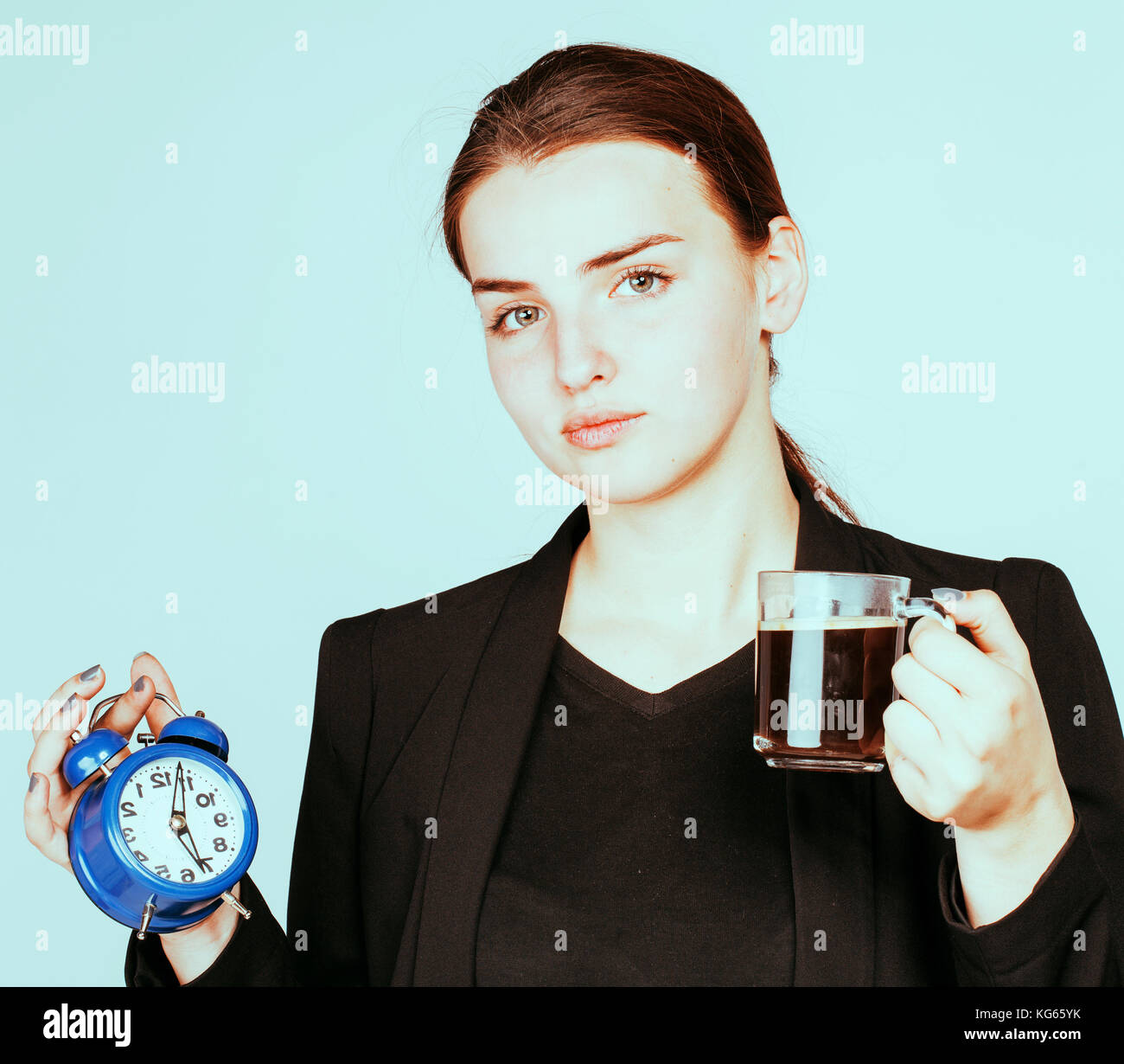 young beauty woman in business style costume waking up for work Stock ...