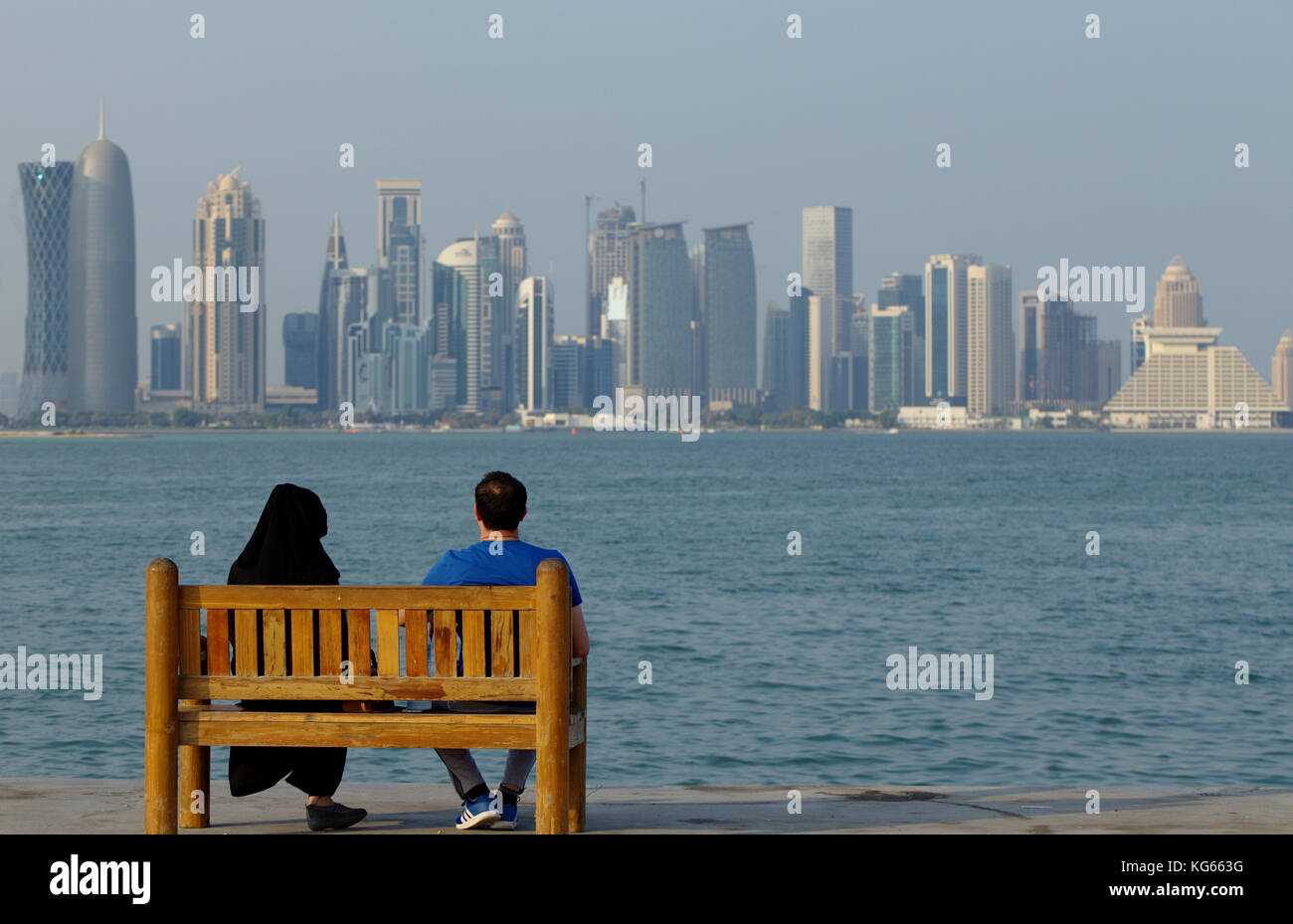 DOHA, QATAR - NOVEMBER 4, 2017: A Muslim couple enjoy the view from the ...