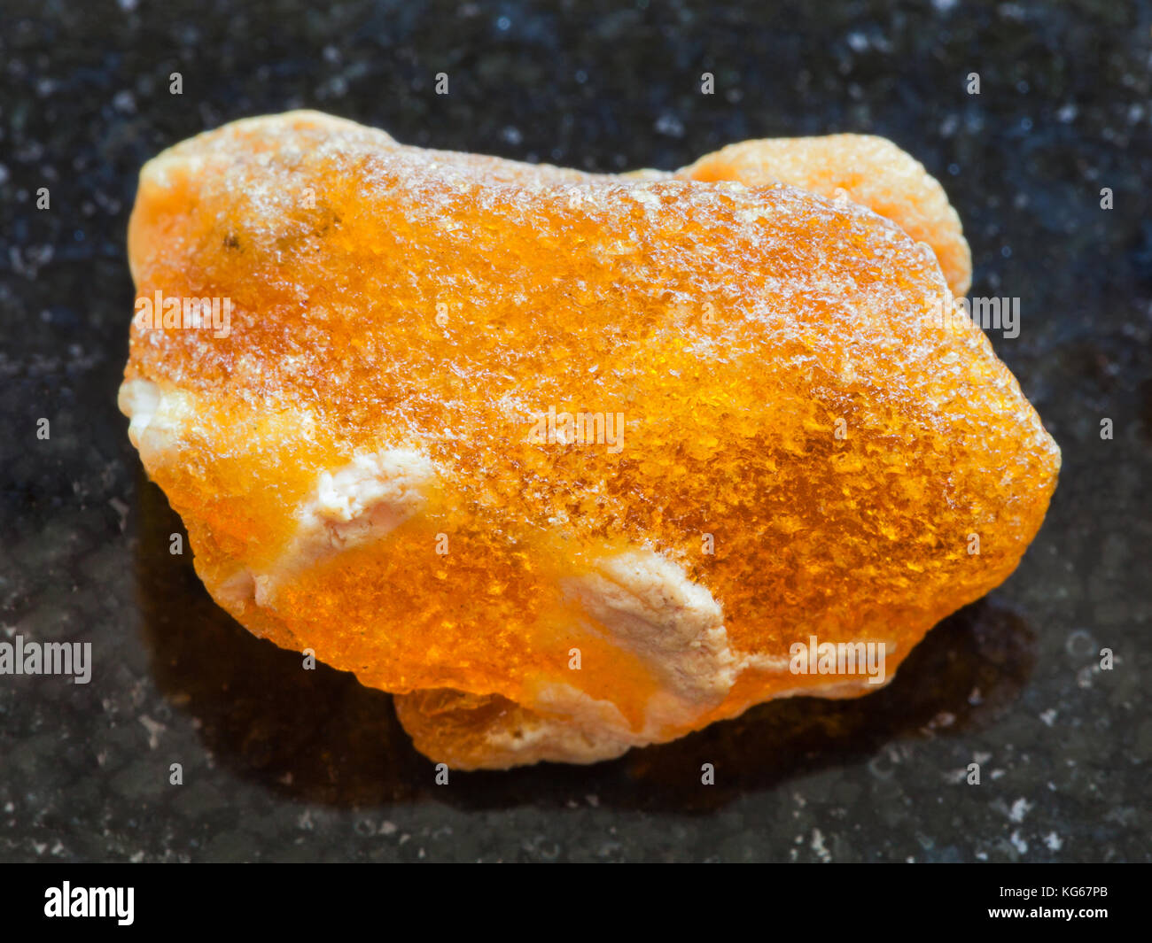 macro shooting of natural mineral rock specimen - raw baltic Amber ...
