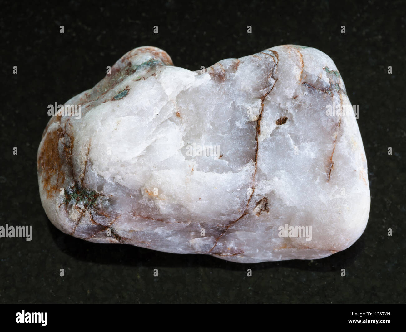 macro shooting of natural mineral rock specimen - raw marble pebble on ...