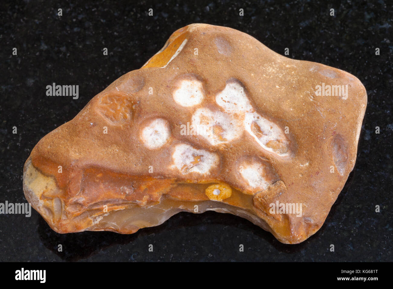macro shooting of natural mineral rock specimen - tumbled yellow Flint ...