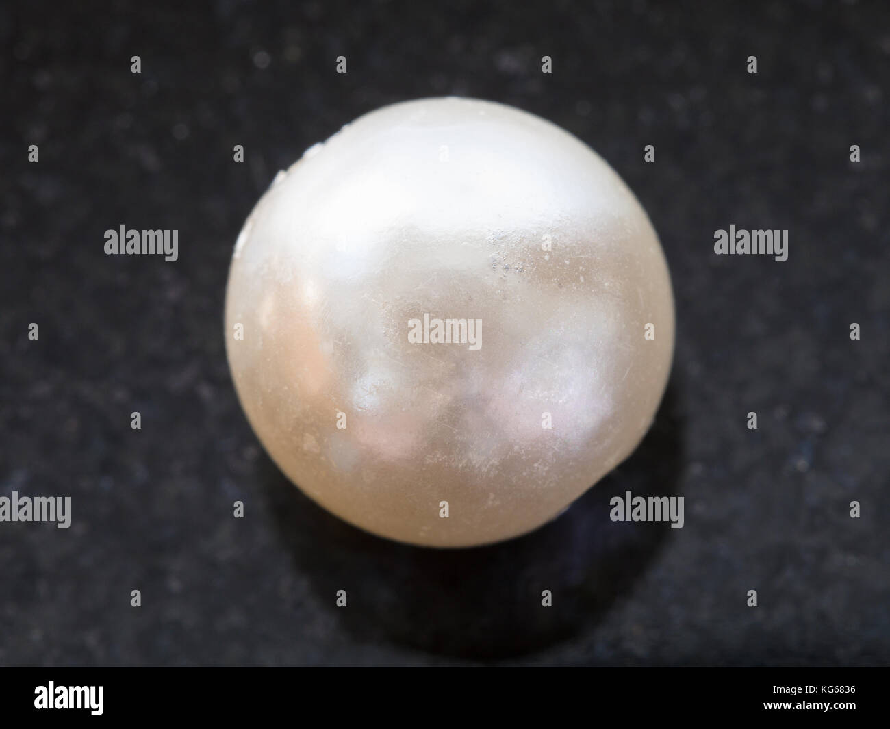 macro shooting of mineral rock specimen - bead from white Pearl ...