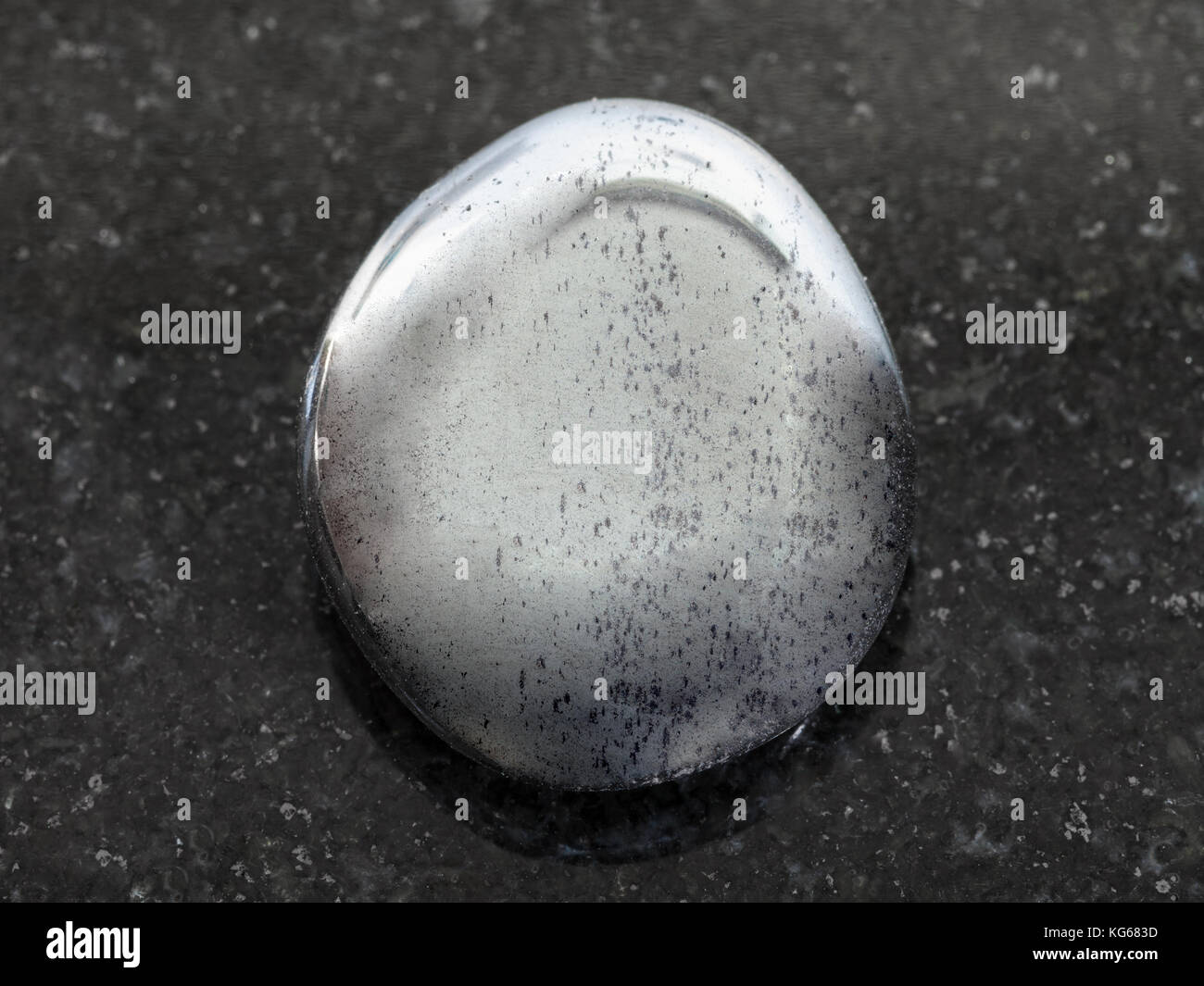 macro shooting of natural mineral rock specimen - polished hematite ...