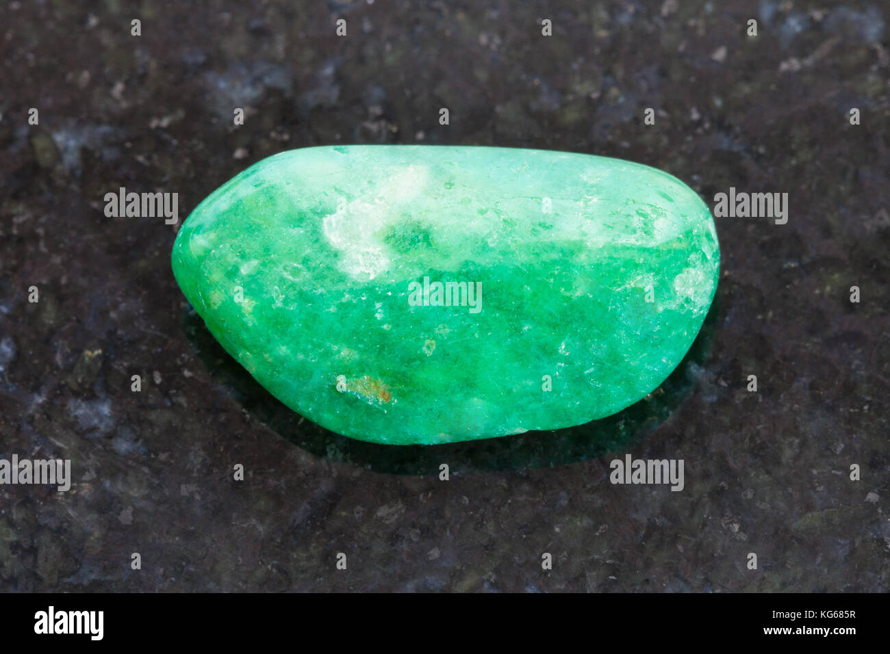 macro shooting of natural mineral rock specimen - pebble of green Agate ...