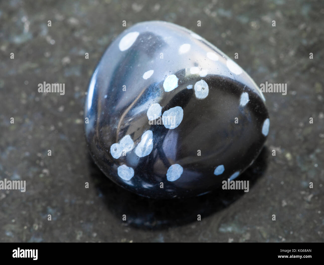 macro shooting of natural mineral rock specimen - tumbled snowflake ...