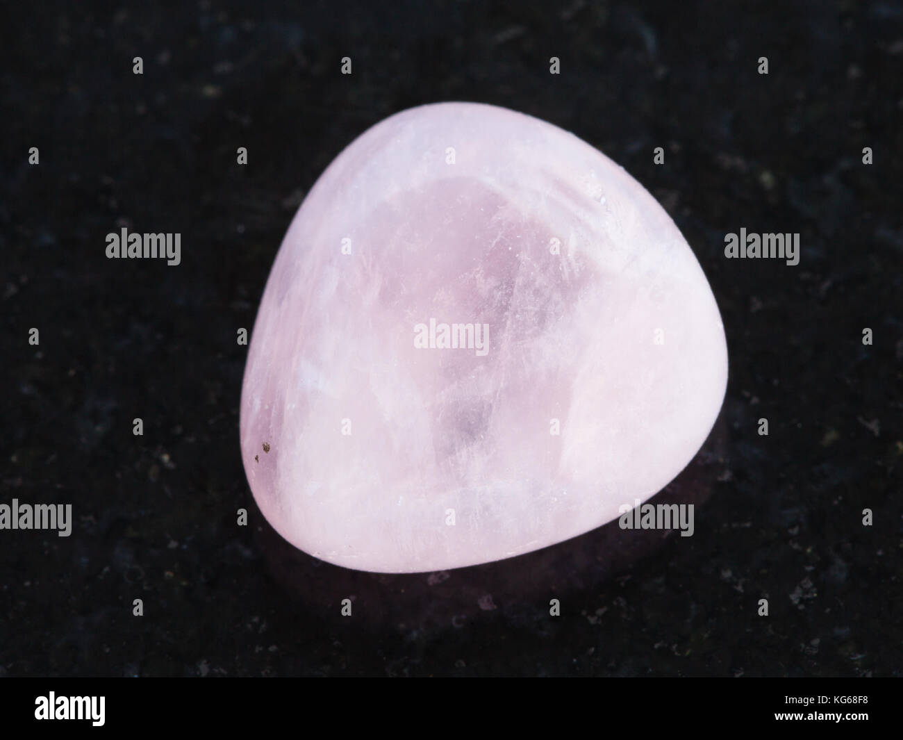 macro shooting of natural mineral rock specimen - polished pink Quartz ...