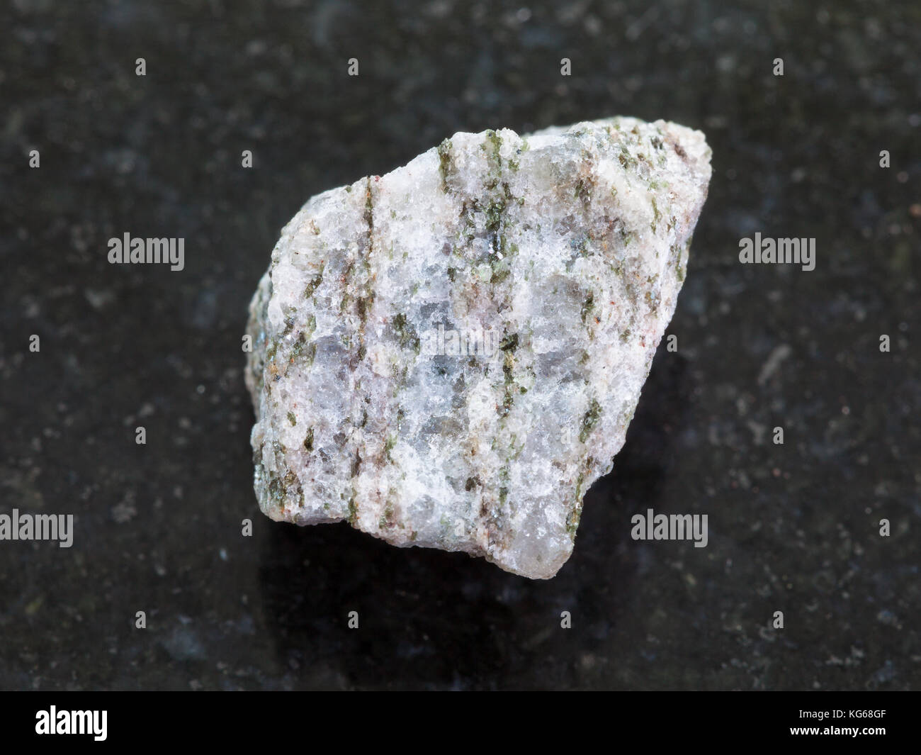 macro shooting of natural mineral rock specimen - rough Apatite ore on ...