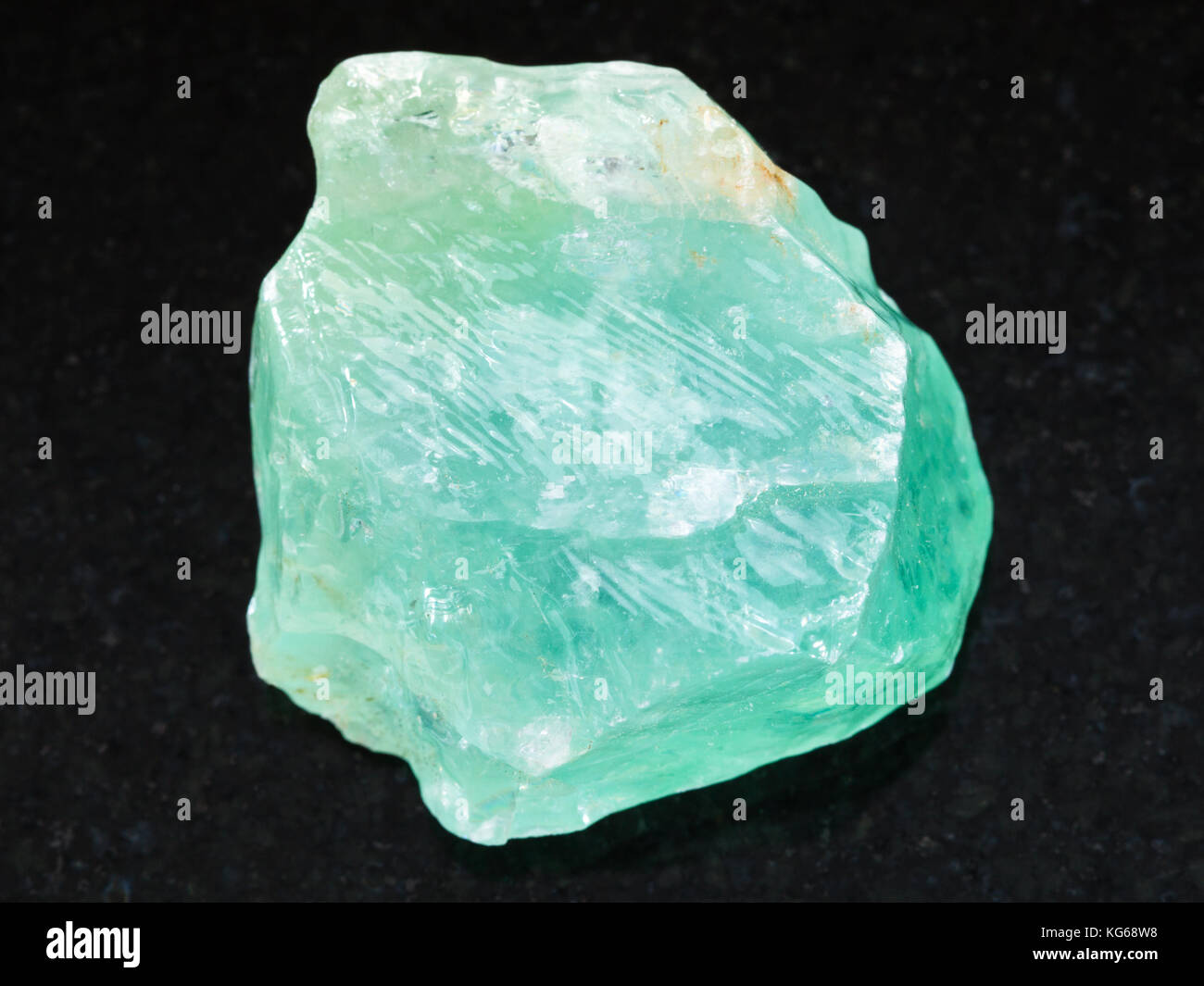macro shooting of natural mineral rock specimen - rough green Calcite ...