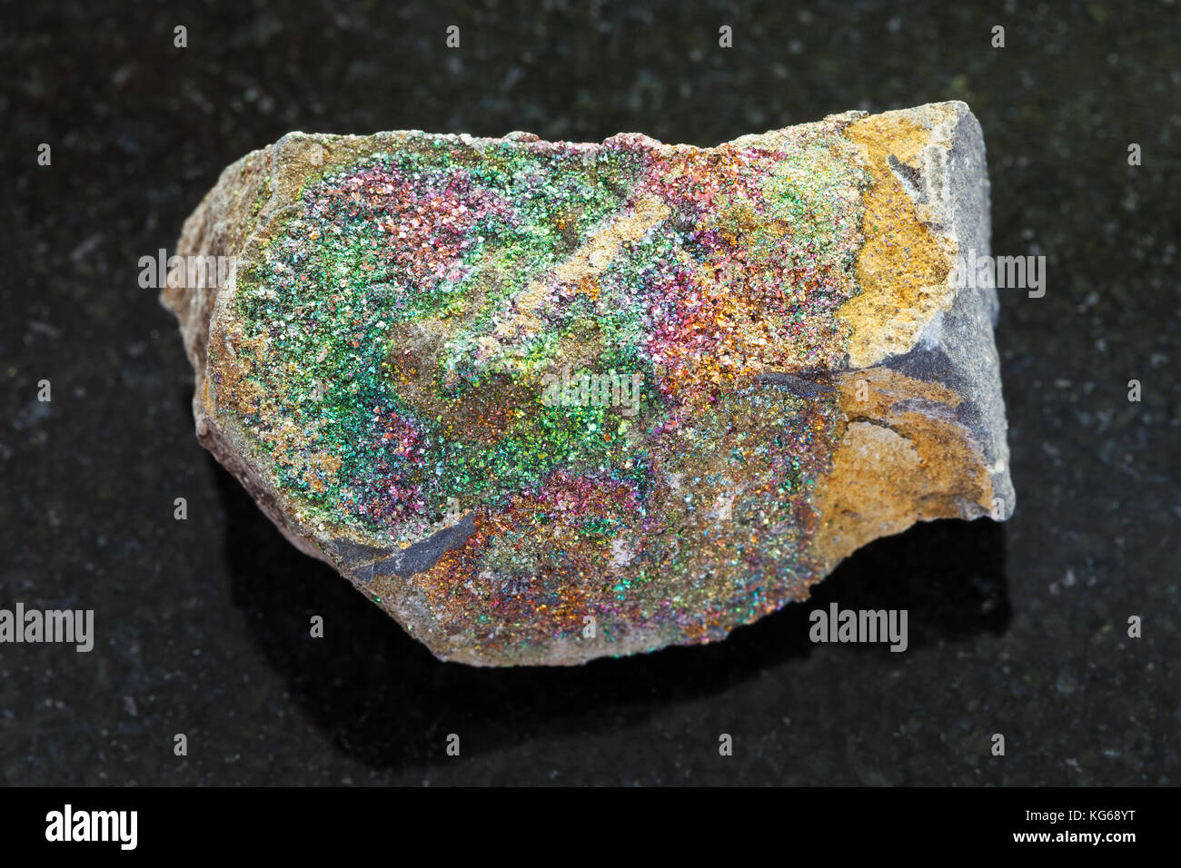 macro shooting of natural mineral rock specimen - raw rainbow pyrite ...