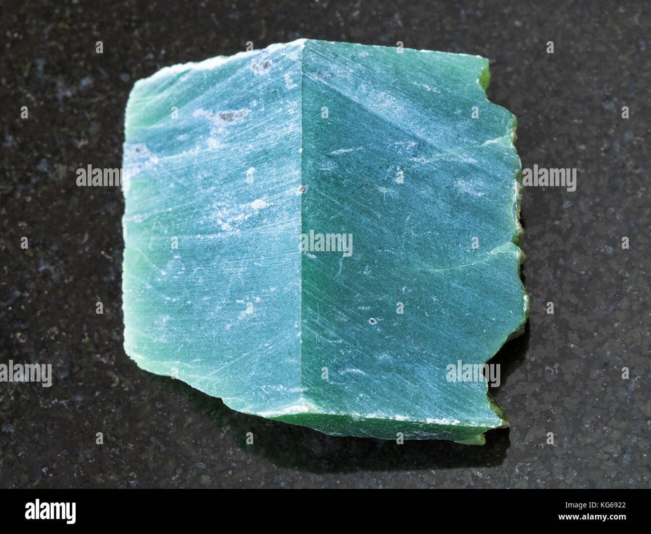 macro shooting of natural mineral rock specimen - rough nephrite stone ...