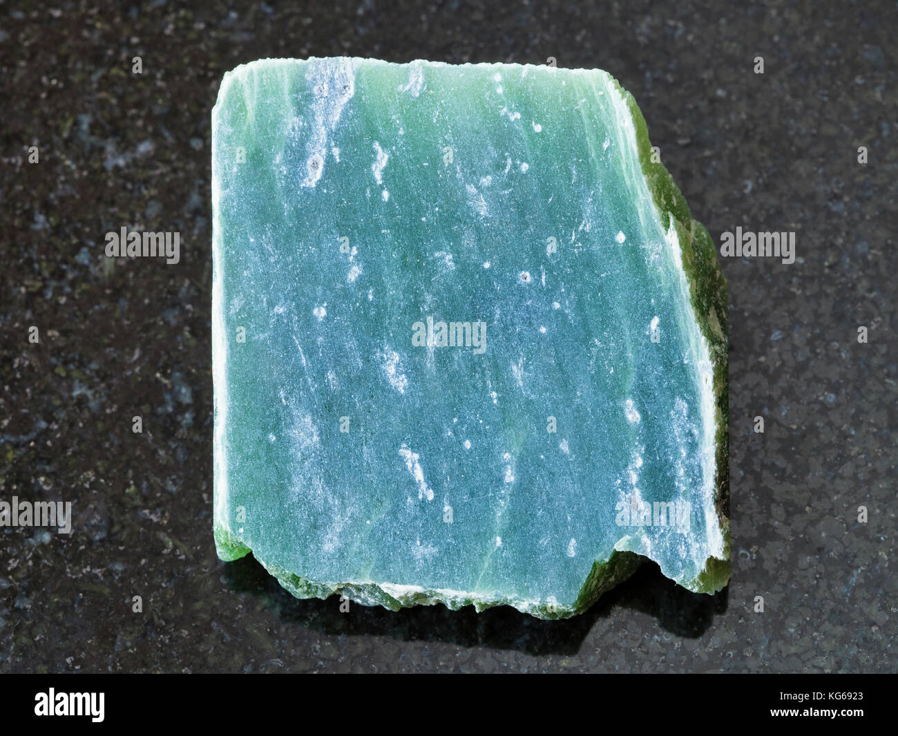 macro shooting of natural mineral rock specimen - raw nephrite stone ...