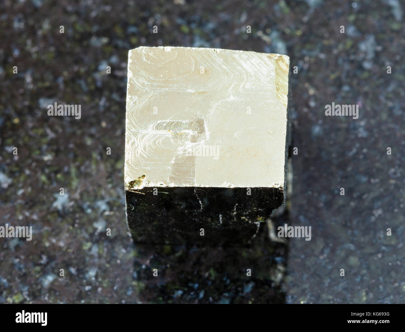 macro shooting of natural mineral rock specimen - rough pyrite cube on ...