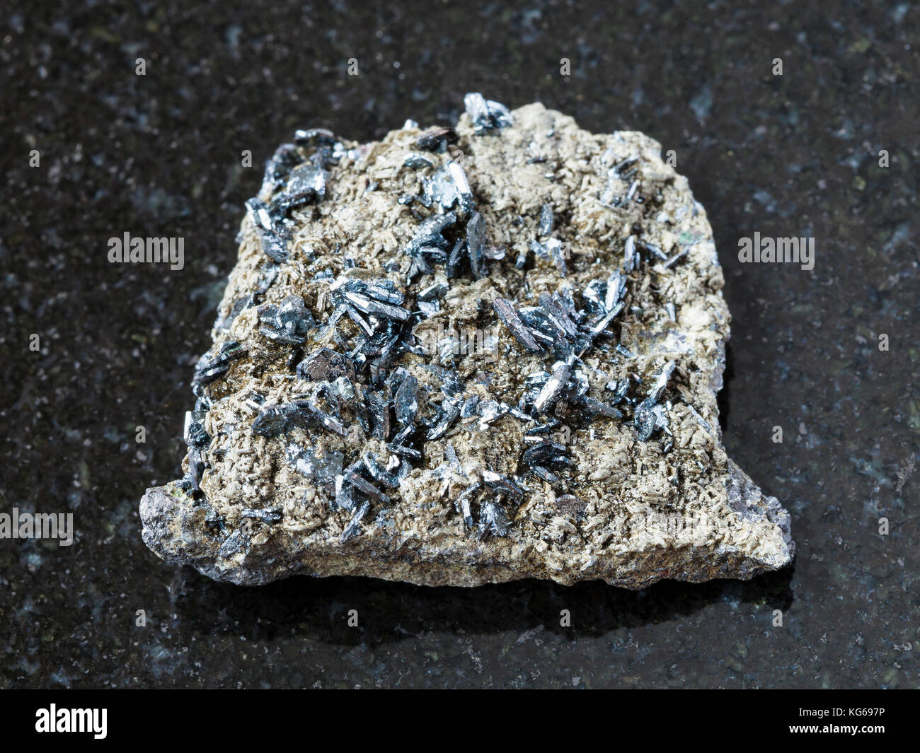 macro shooting of natural mineral rock specimen - magnetite crystals on ...