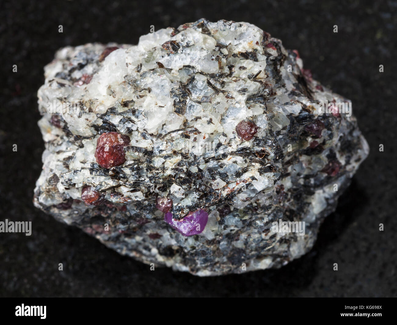 macro shooting of natural mineral rock specimen - corundum crystals in ...
