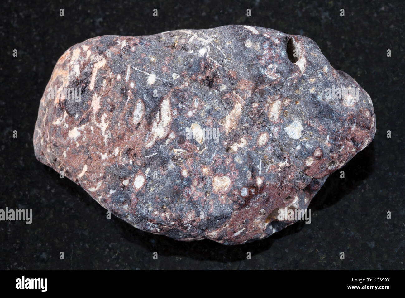 macro shooting of natural mineral rock specimen - piece of porous ...