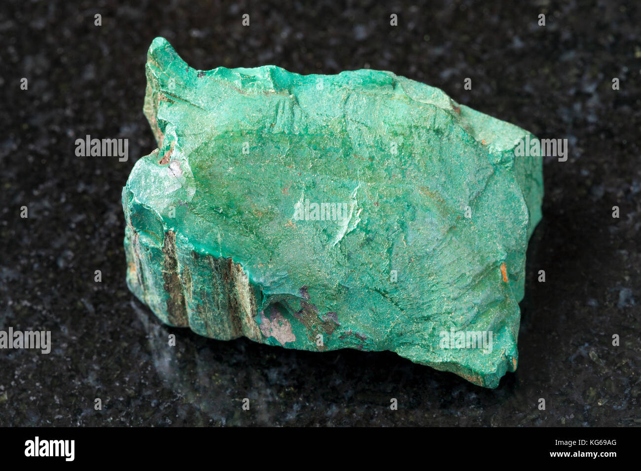 macro shooting of natural mineral rock specimen - raw Volkonskoite ...