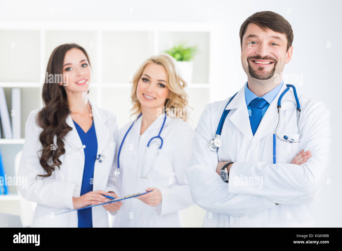 Team of doctors in a clinical office Stock Photo - Alamy