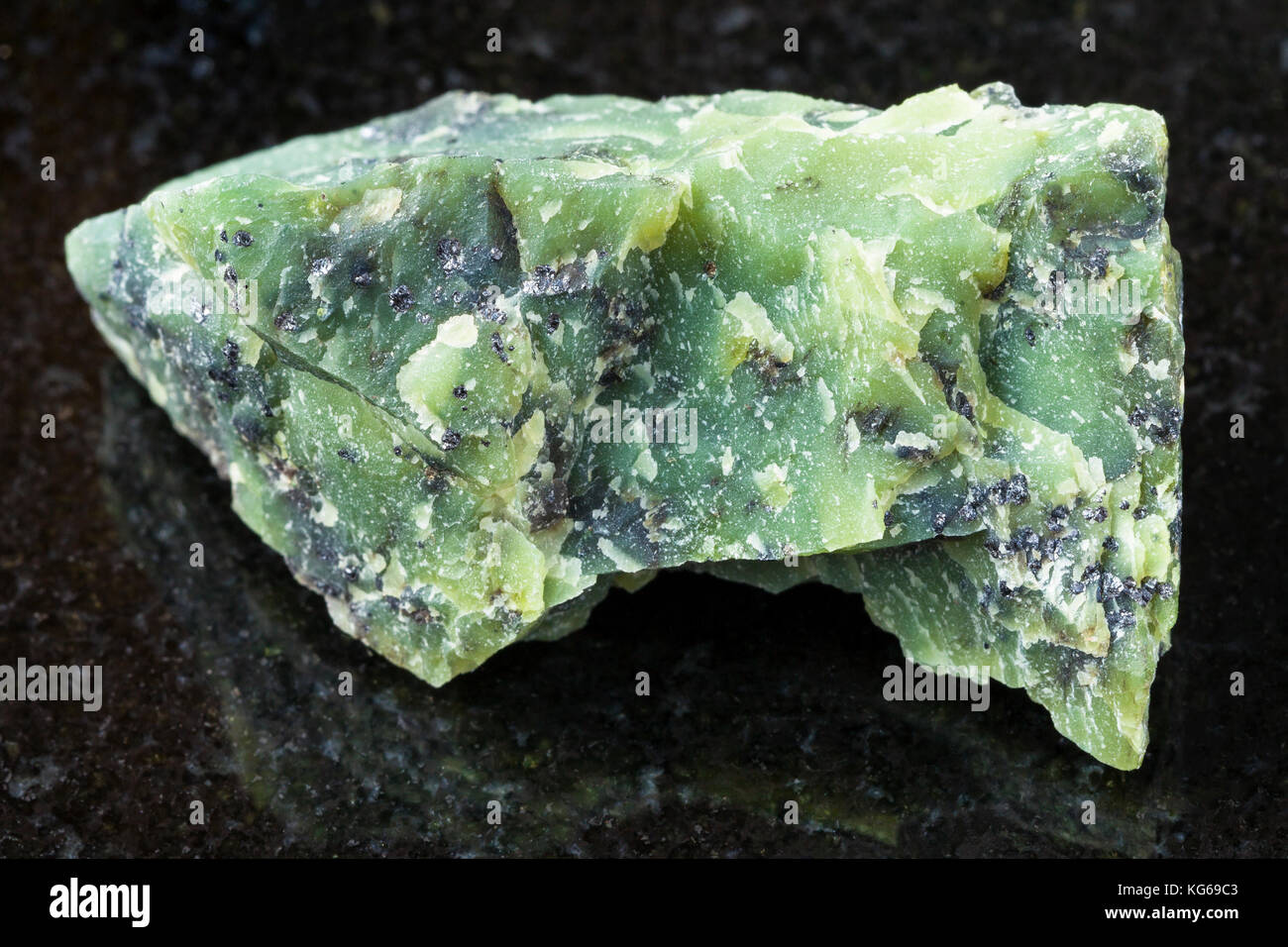 macro shooting of natural mineral rock specimen - rough Lizardite stone ...