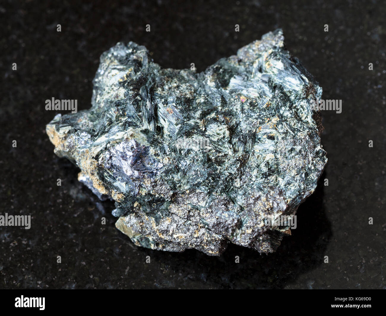 macro shooting of natural mineral rock specimen - Molybdenite crystal ...