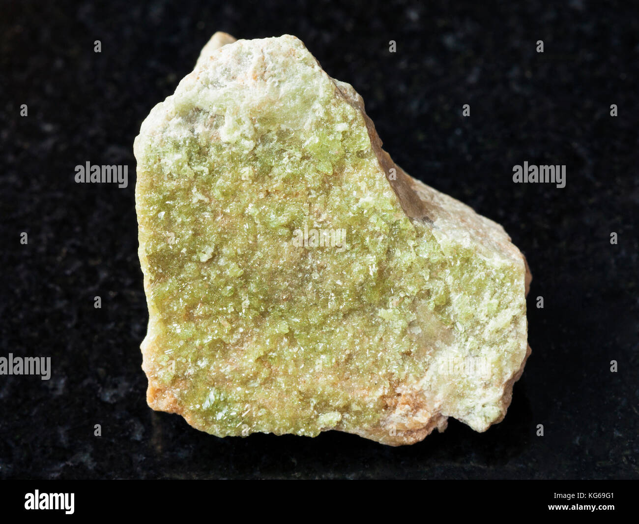 macro shooting of natural mineral rock specimen - green Vesuvianite ...