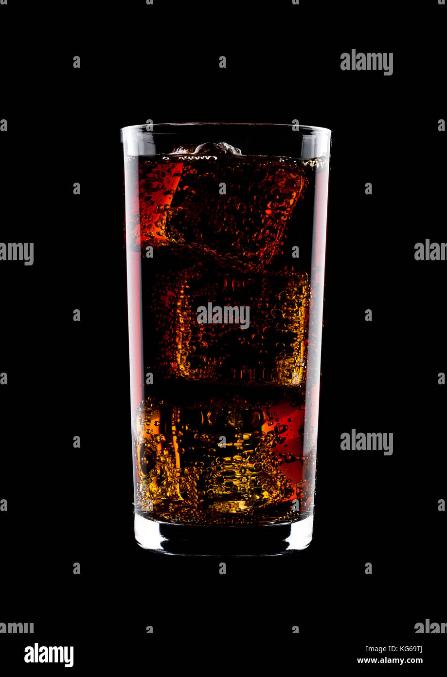 Glass of cold cola soda drink with ice cubes on black background Stock Photo - Alamy