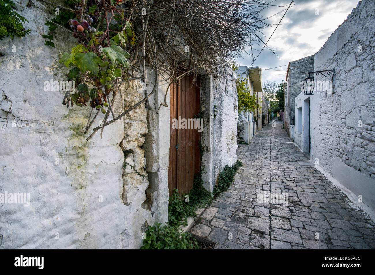 Traditional houses and old buildings at the village of Archanes ...
