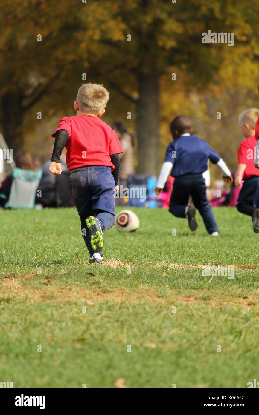 Running after the soccer ball Stock Photo - Alamy