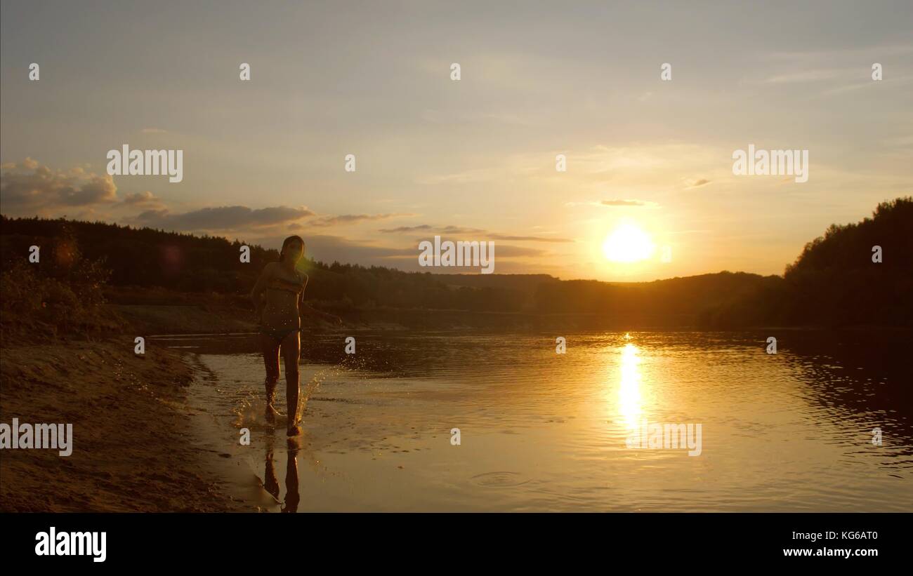 Splashing footprints hi-res stock photography and images - Alamy