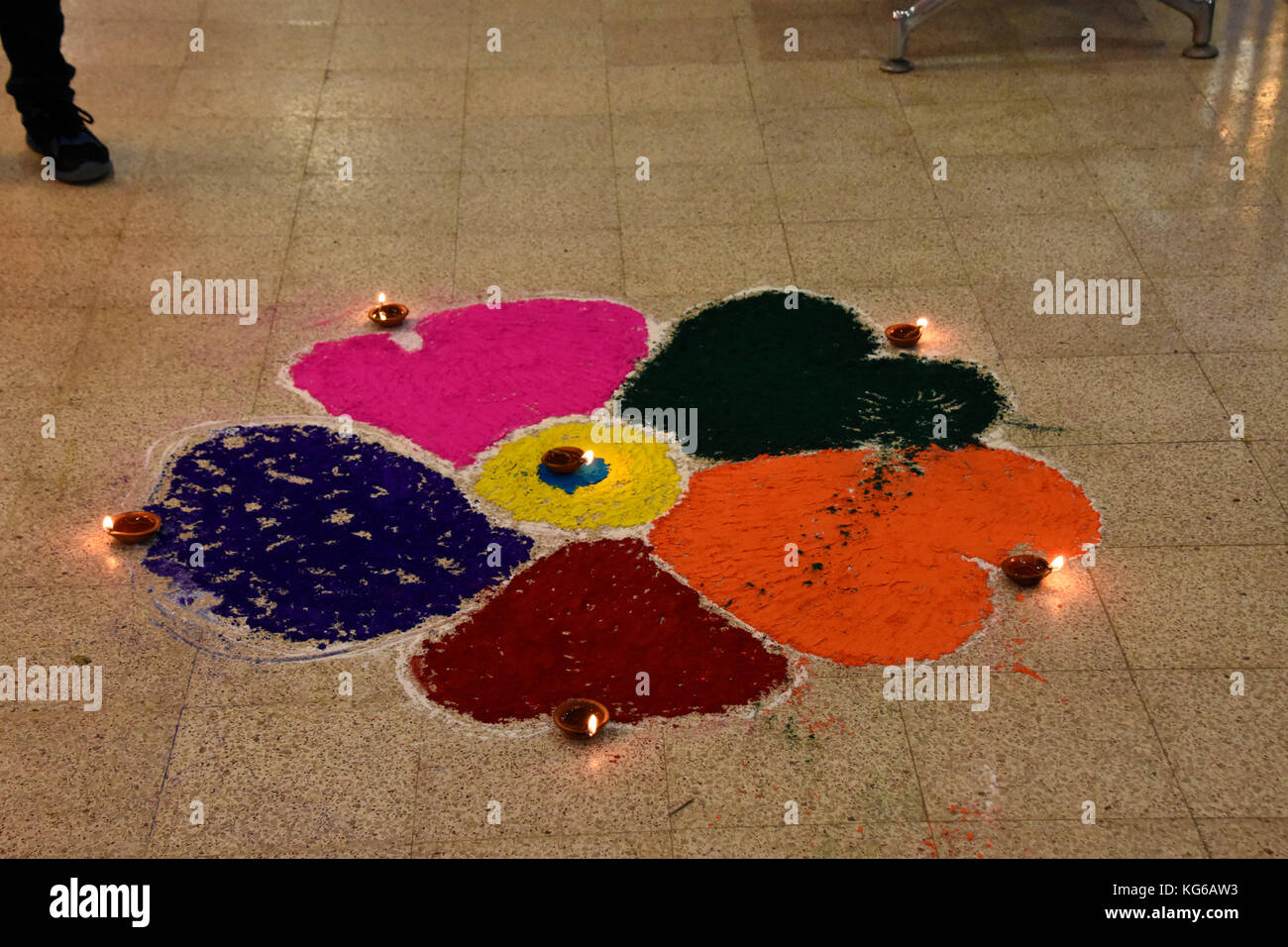 Indoor shopping center with Diwali Mandles on the floor Stock Photo - Alamy