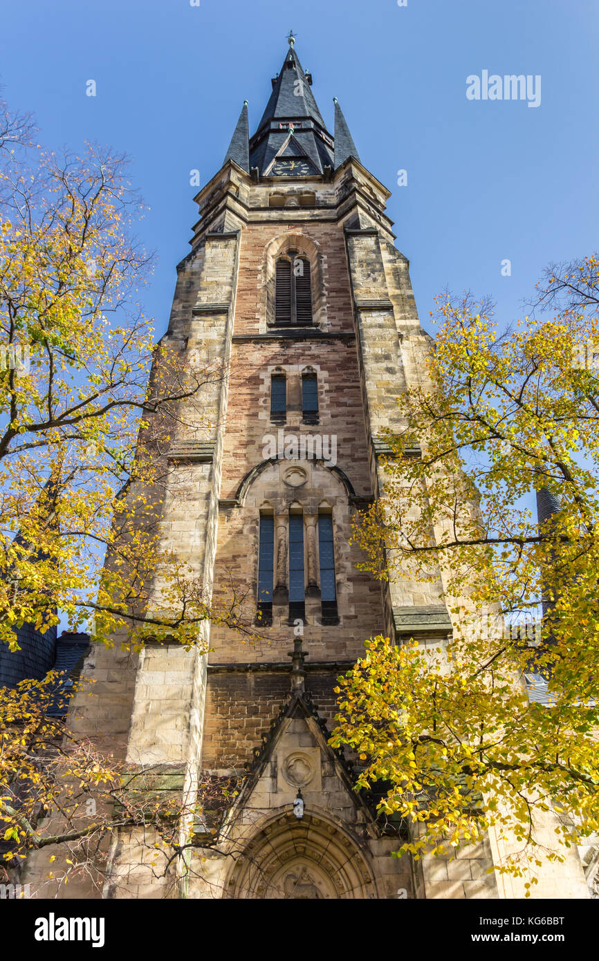 Fall colors and tower of the Liebfrauen church in Wernigerode, Germany ...