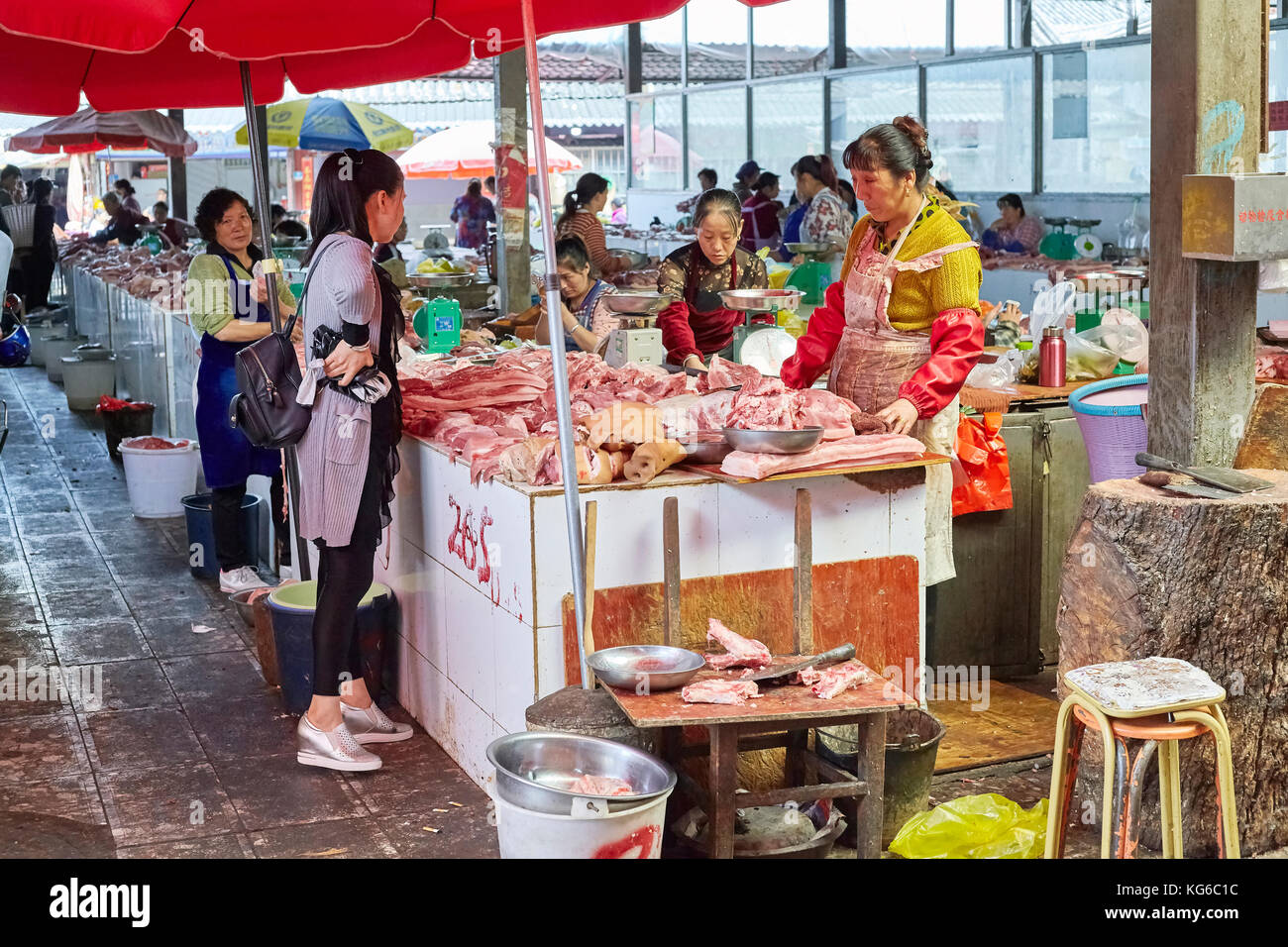 Lijiang, Yunnan, China - September 27, 2017: Customer chooses fresh ...